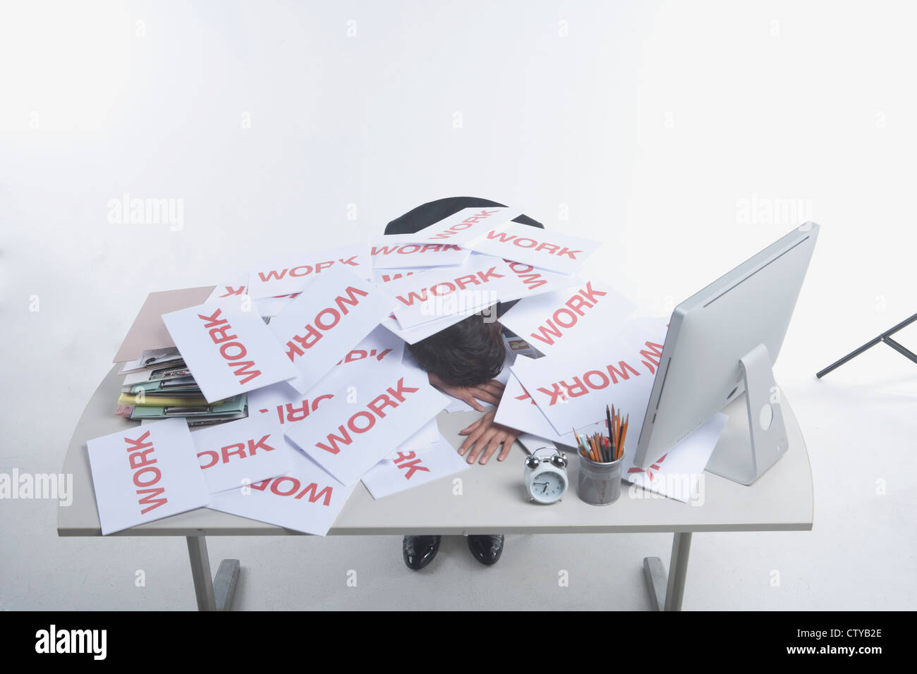Lying under desk work hi-res stock photography and images - Alamy