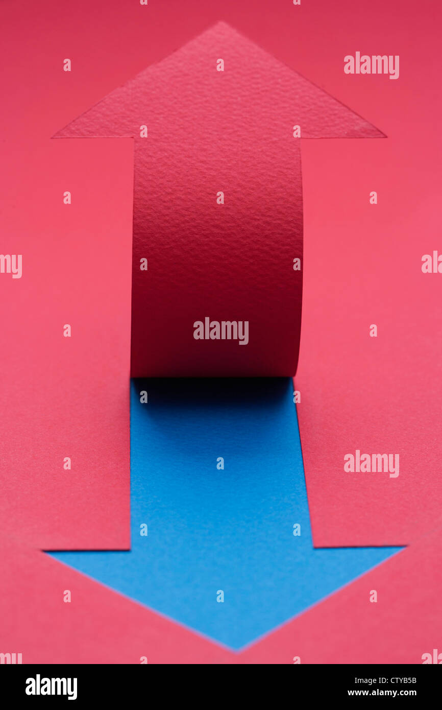 Red rising arrow and blue dropping arrow Stock Photo - Alamy