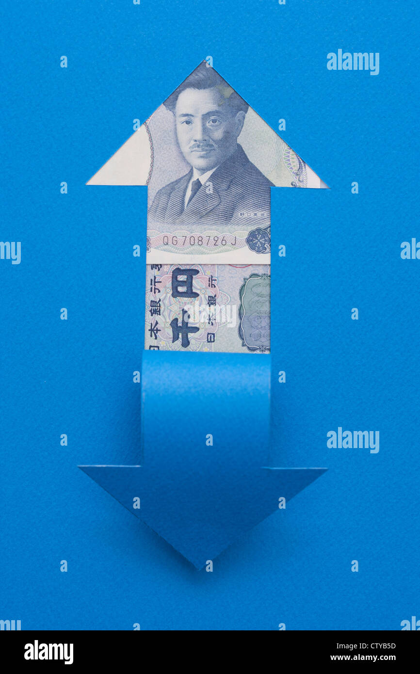Yen arrow and blue dropping arrow Stock Photo - Alamy