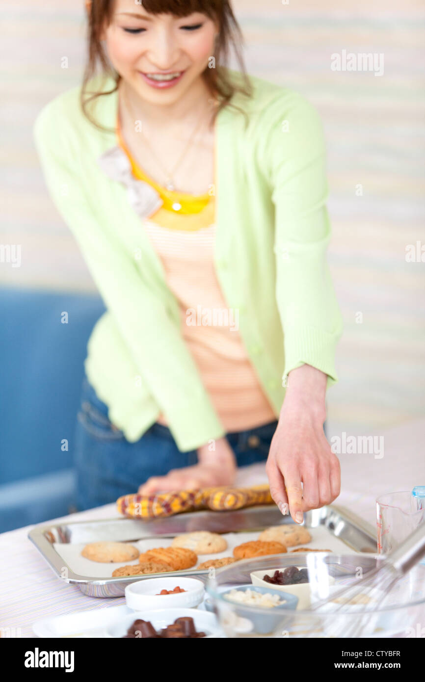 Woman pointing at food Stock Photo - Alamy