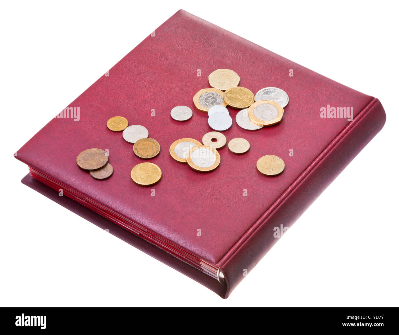 different coins on red numismatics album and isolated on white Stock ...