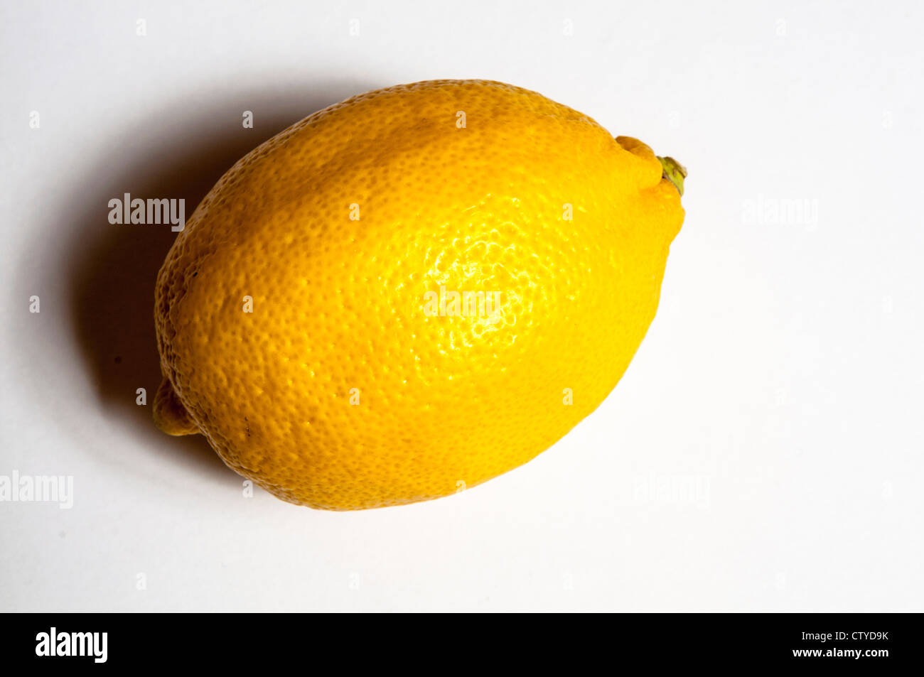 Whole lemon on white background Stock Photo - Alamy