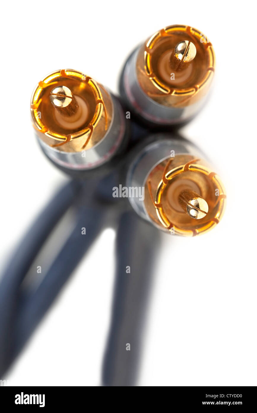 three gold plugs isolated on white close up Stock Photo - Alamy