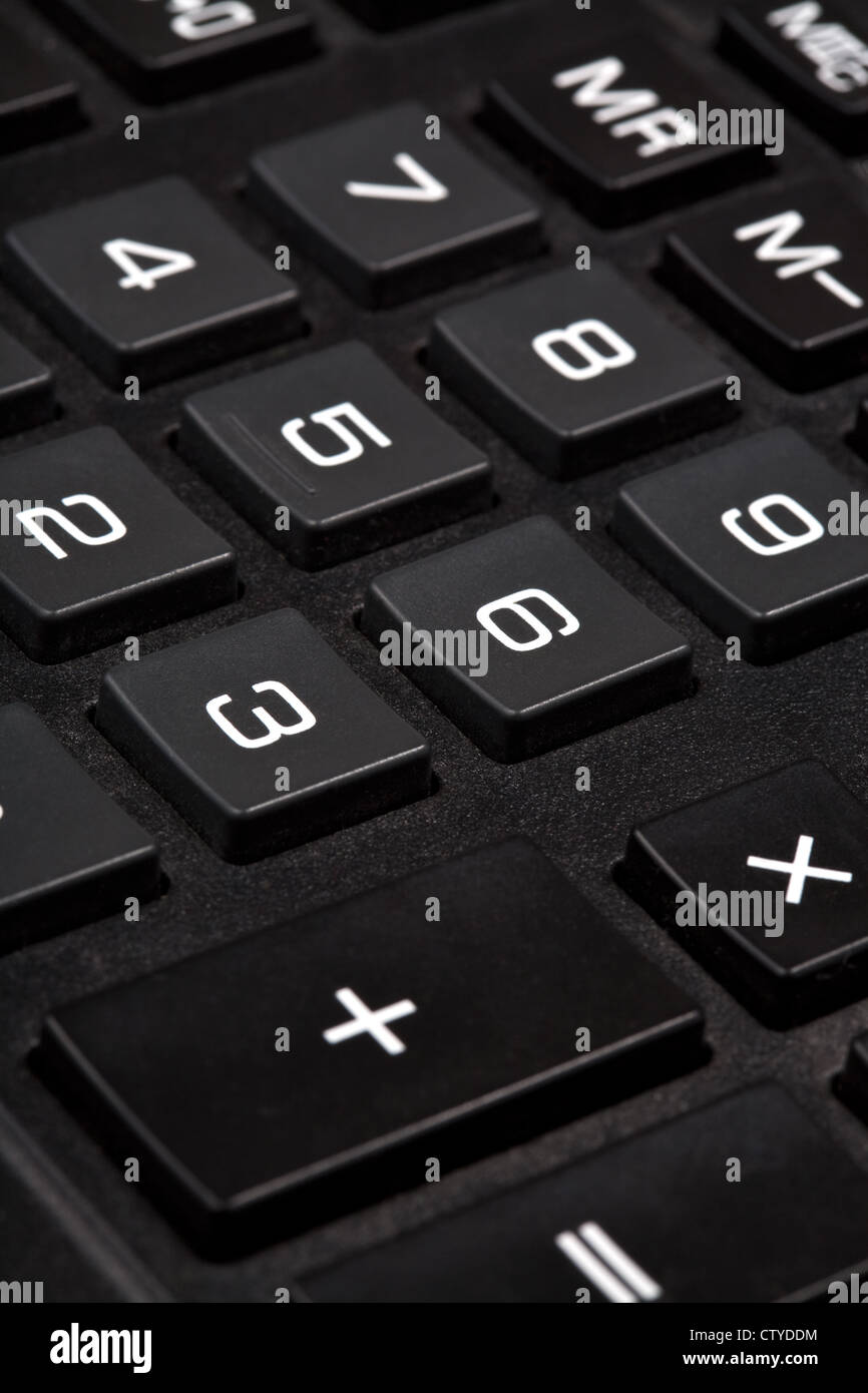 sum button on black calculator close up Stock Photo - Alamy