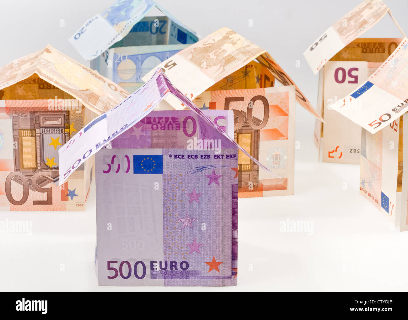 expensive houses from euro banknotes Stock Photo - Alamy