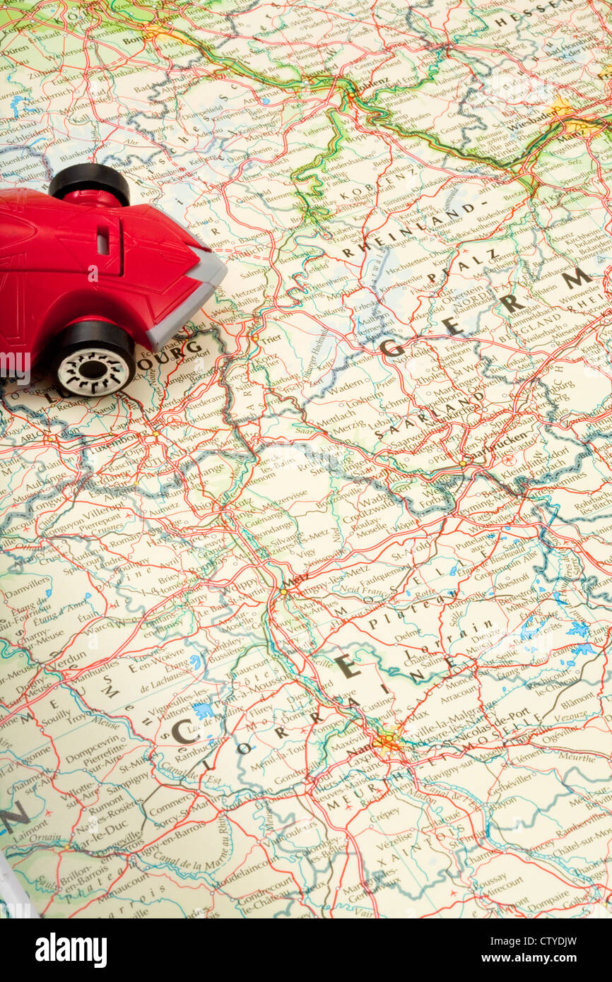 traveling by car on world map Stock Photo - Alamy