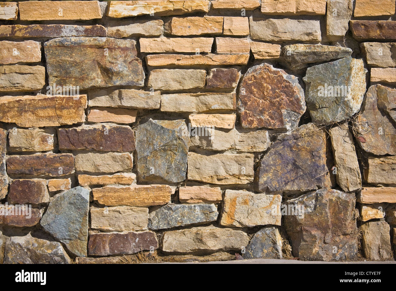 Texture of stone wall of various colors hi-res stock photography and ...