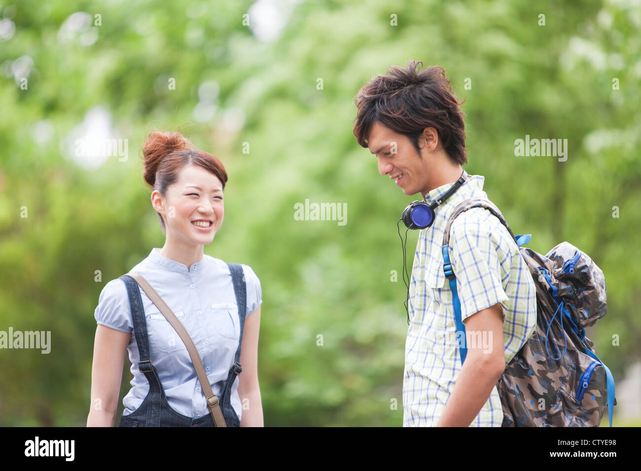 Two university students talking Stock Photo - Alamy