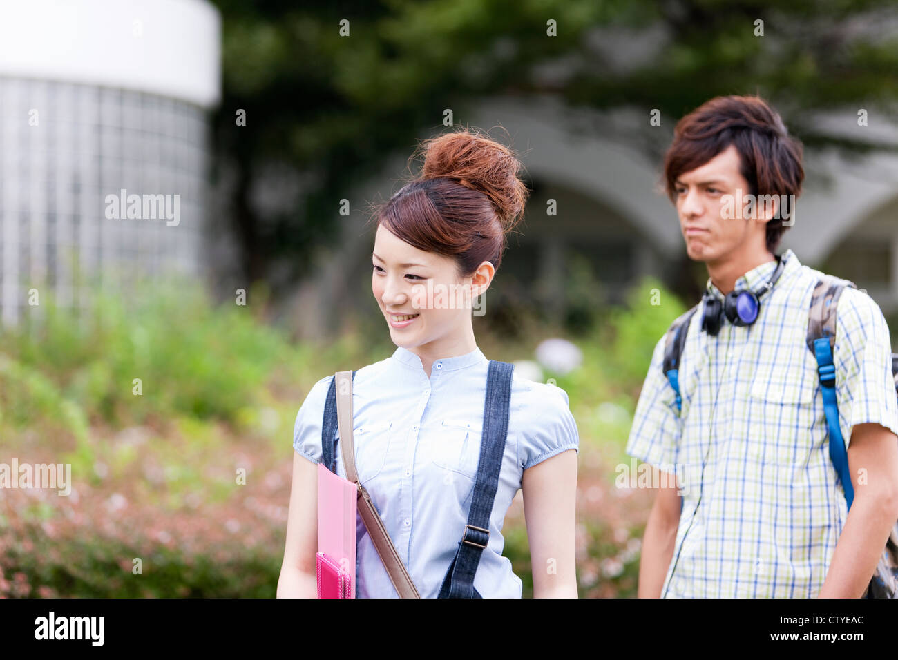 Two university students walking Stock Photo - Alamy