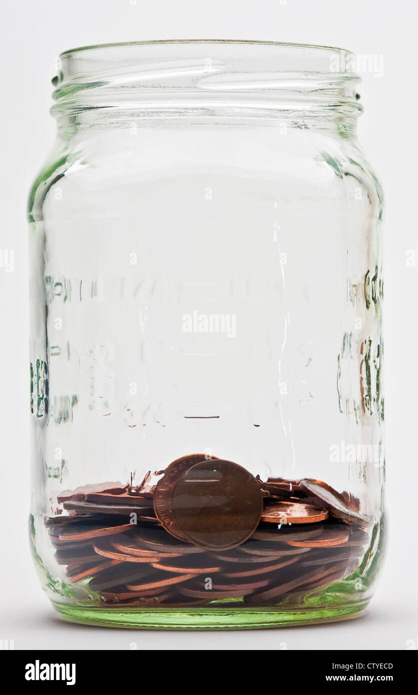 one-quarter full jar of US pennies Stock Photo - Alamy
