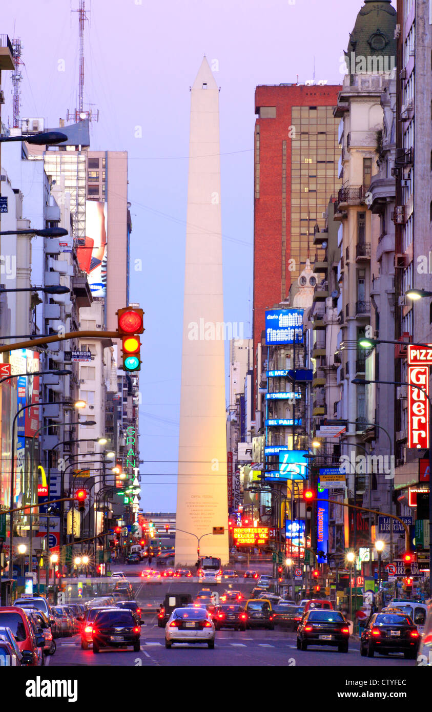 Far view of Corrientes Avenue, with Obelisco Monument and cars, at ...