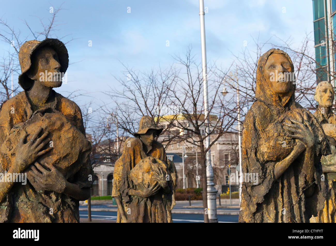 Monument to the Potato Famine Victims on the quayside of the River ...