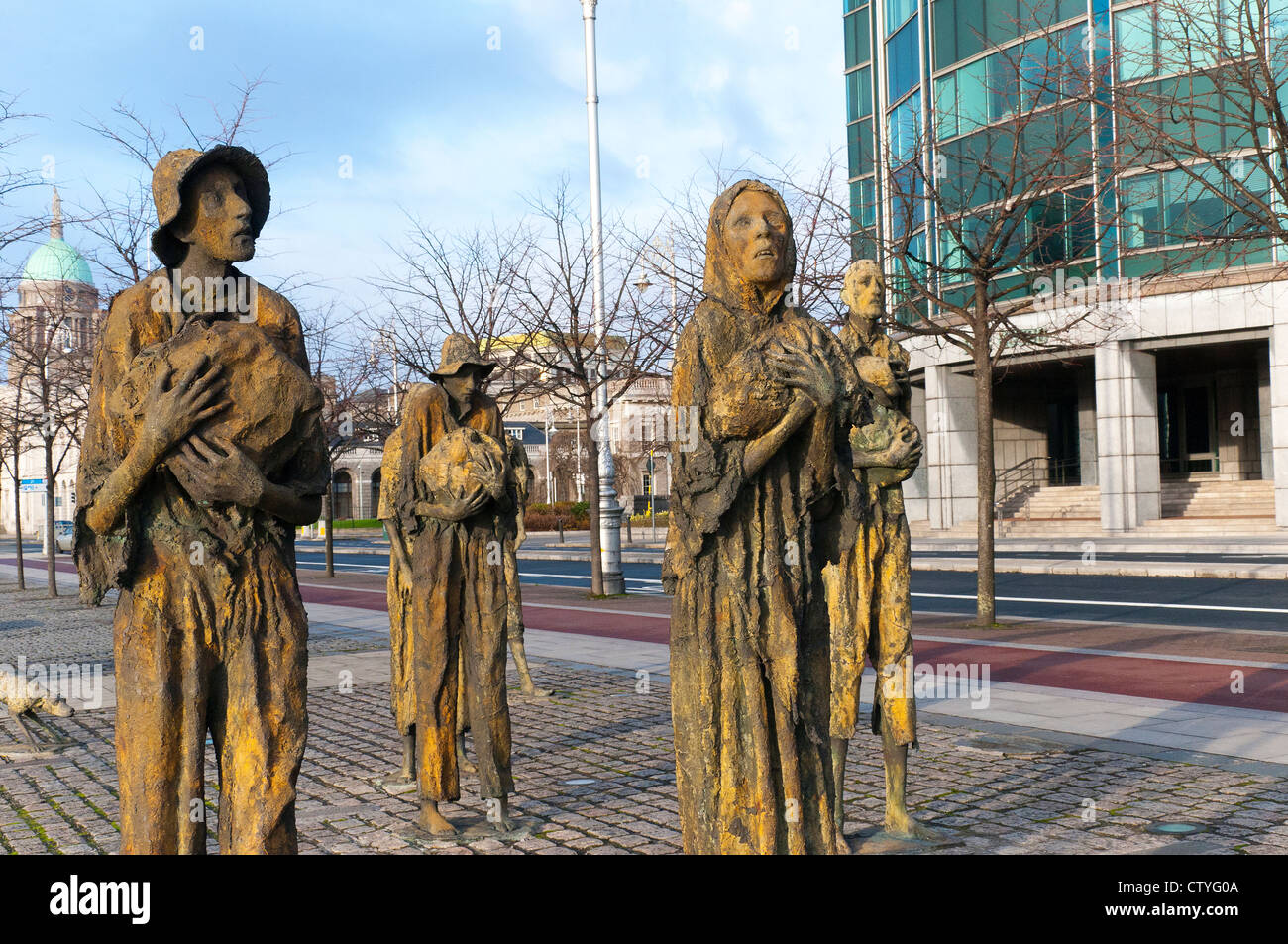 Monument to the Potato Famine Victims on the quayside of the River ...