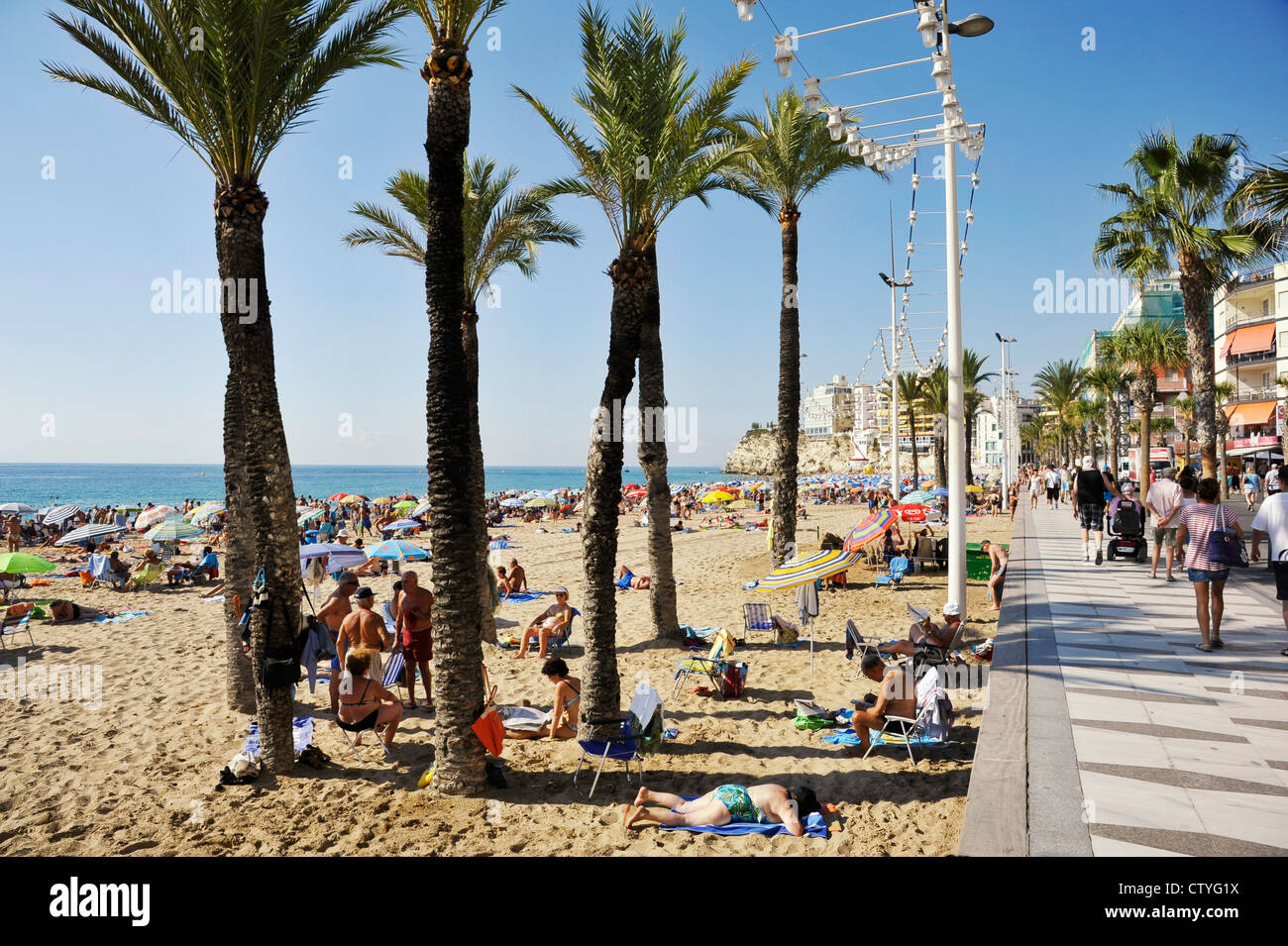 People on Levante Beach and promenade in Benidorm, Spain Stock Photo ...