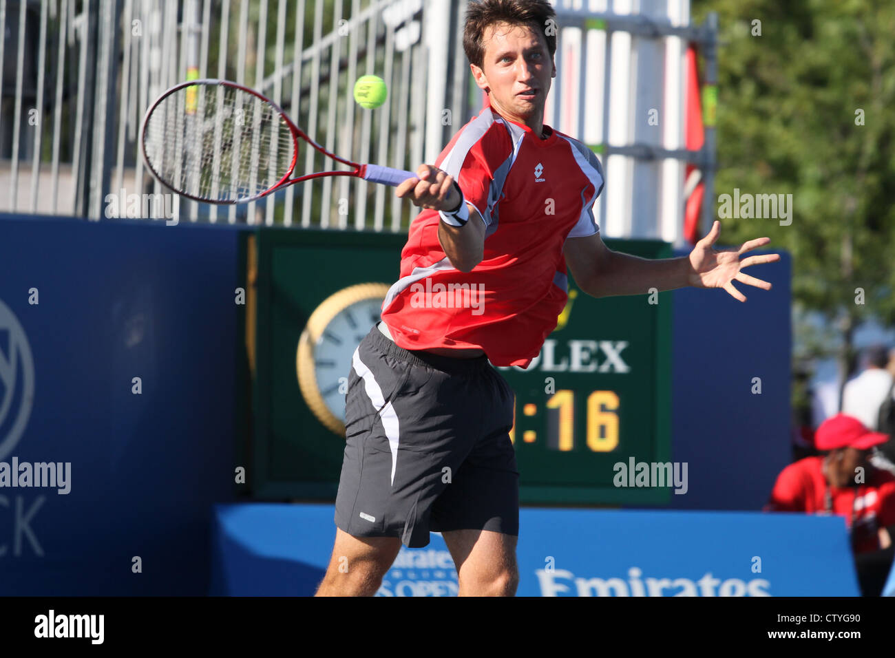 tennis action forehand return man playing Stock Photo - Alamy