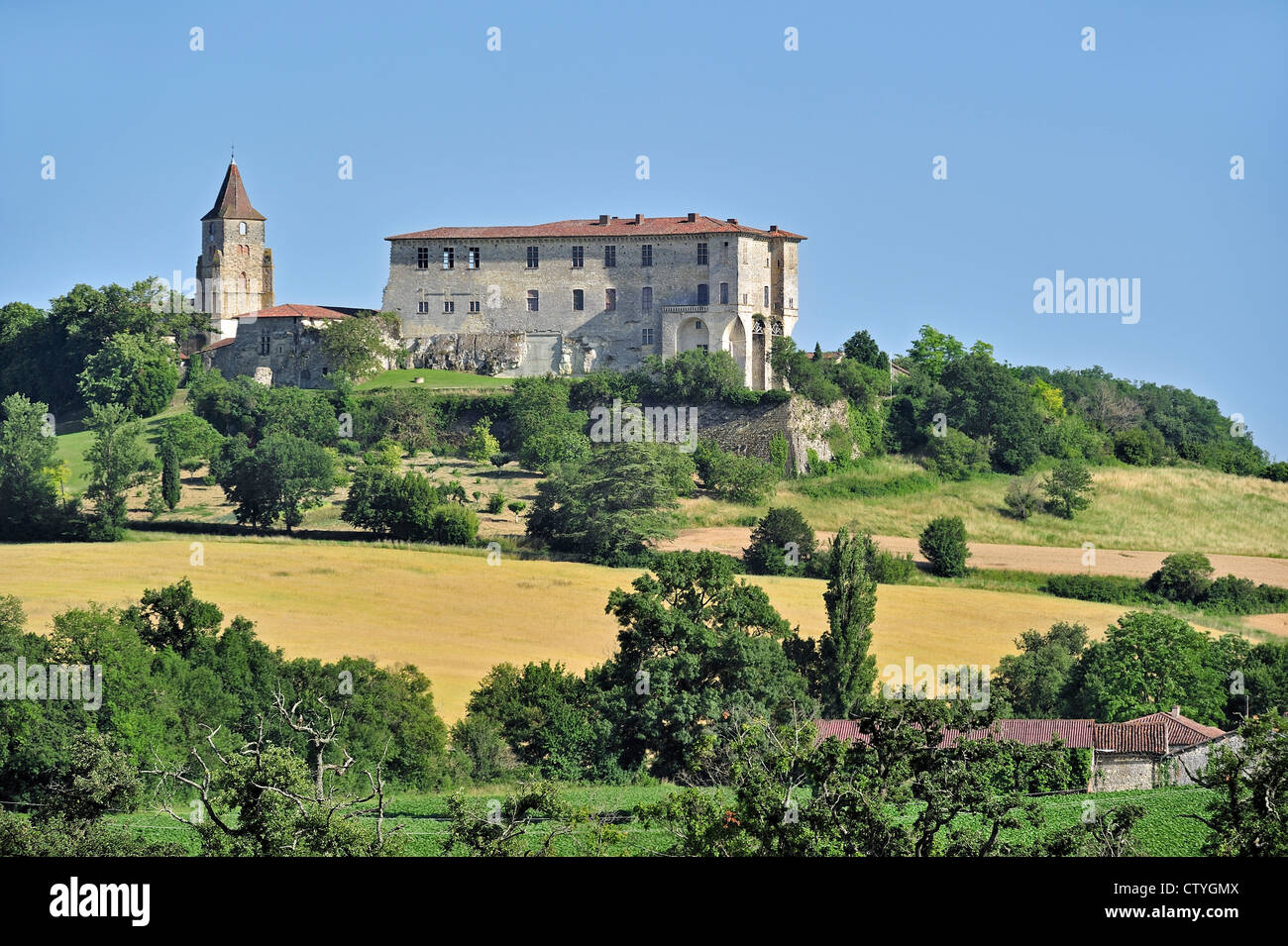 Church and the medieval castle Château de Lavardens in the Midi ...