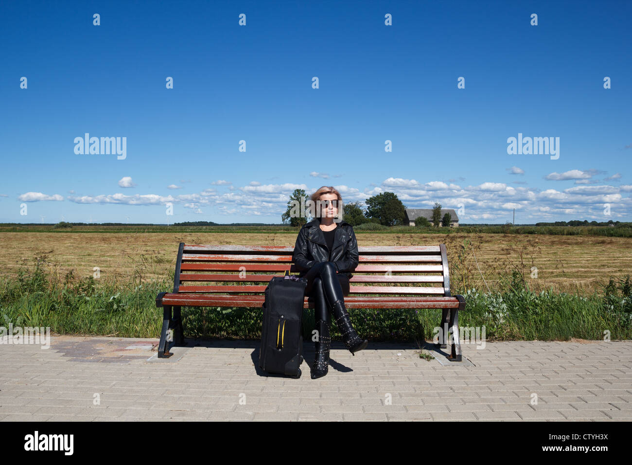 lonely bus stop at countryside with women on bench Stock Photo - Alamy