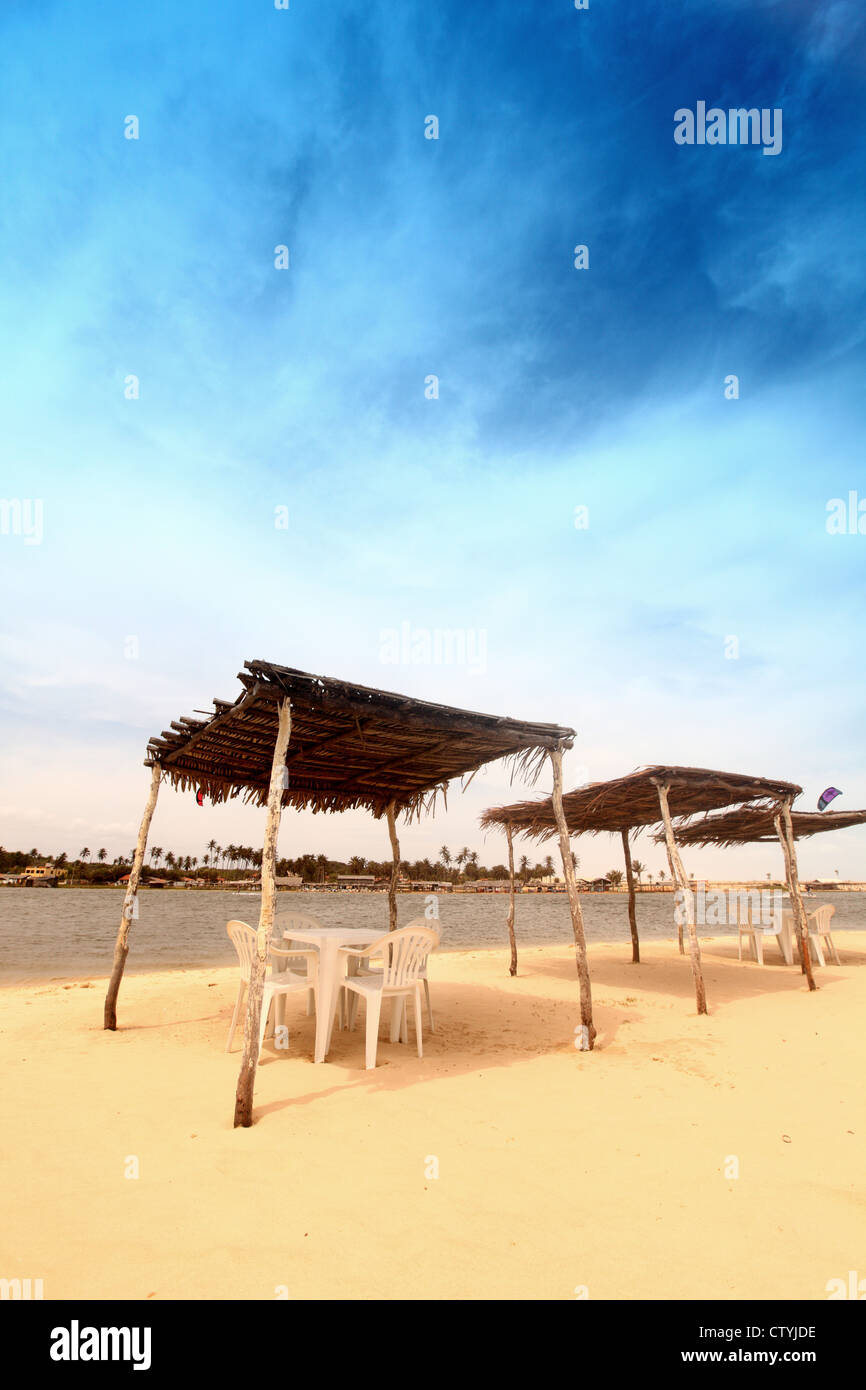 awning in sand near water Stock Photo - Alamy