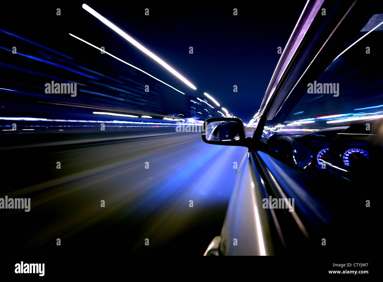 car fast drive on highway in night Stock Photo - Alamy