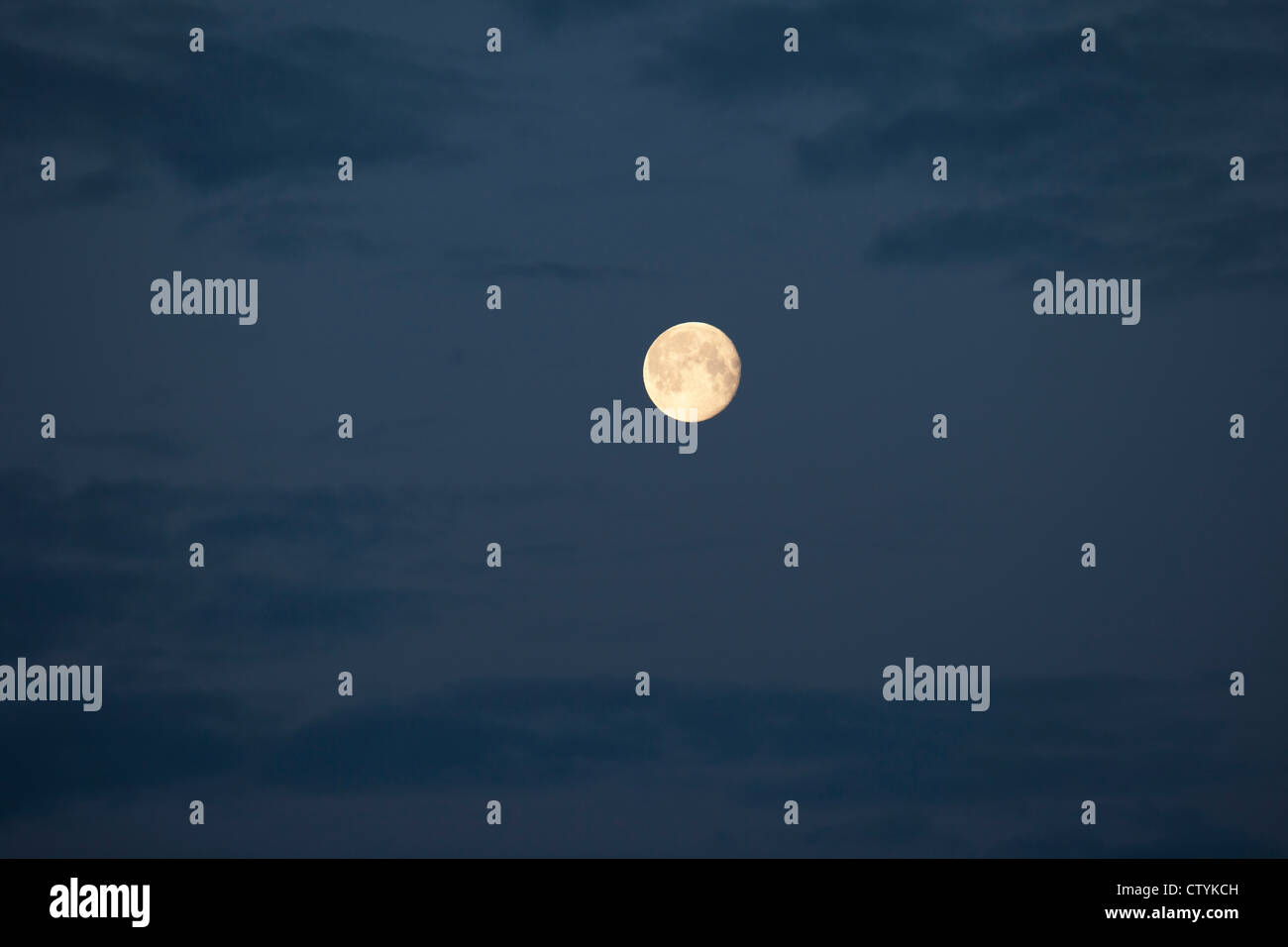 Moon behind the clouds hi-res stock photography and images - Alamy