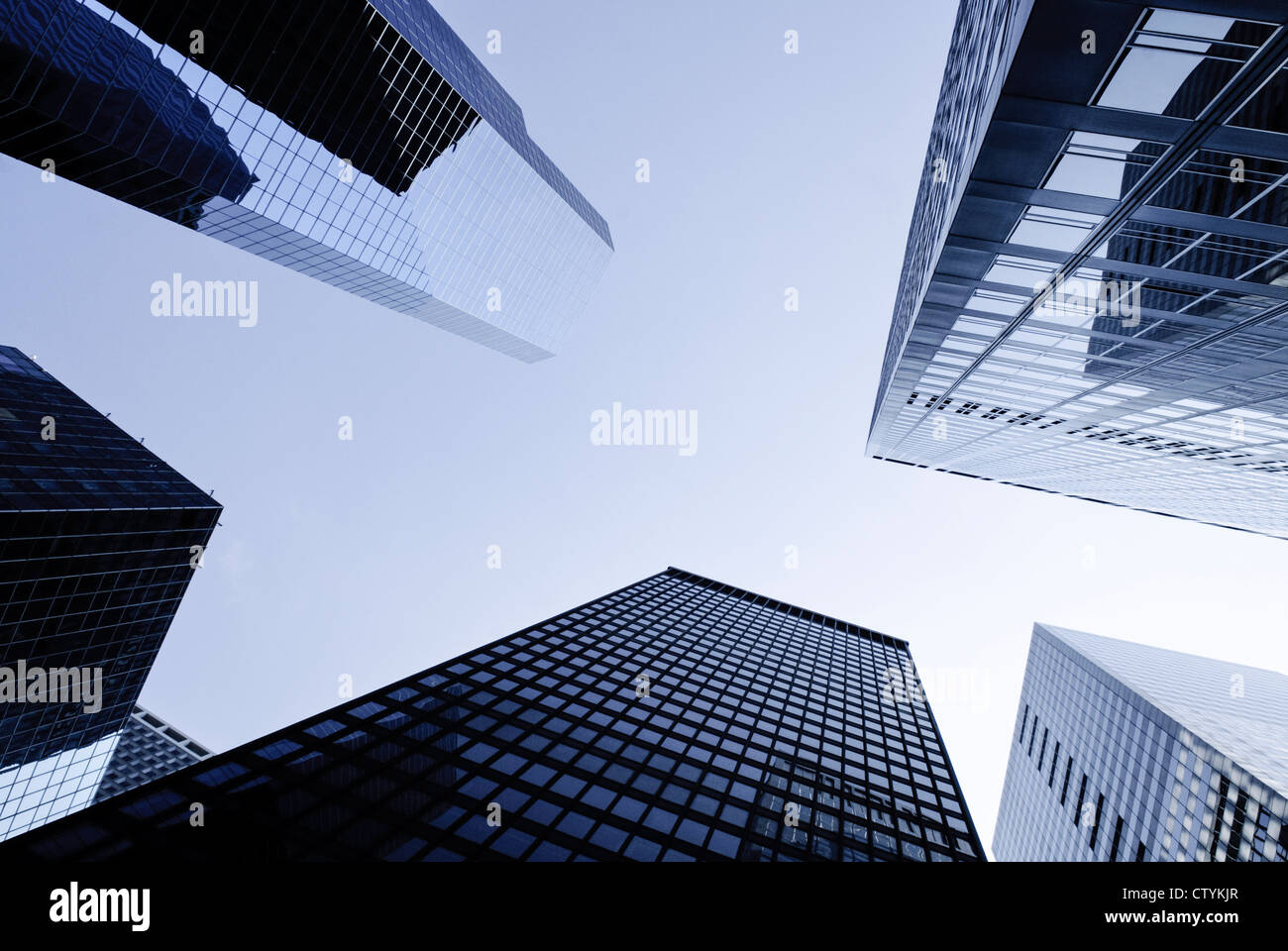 monochromatic low angle shot of multistory buildings in the Manhattan ...