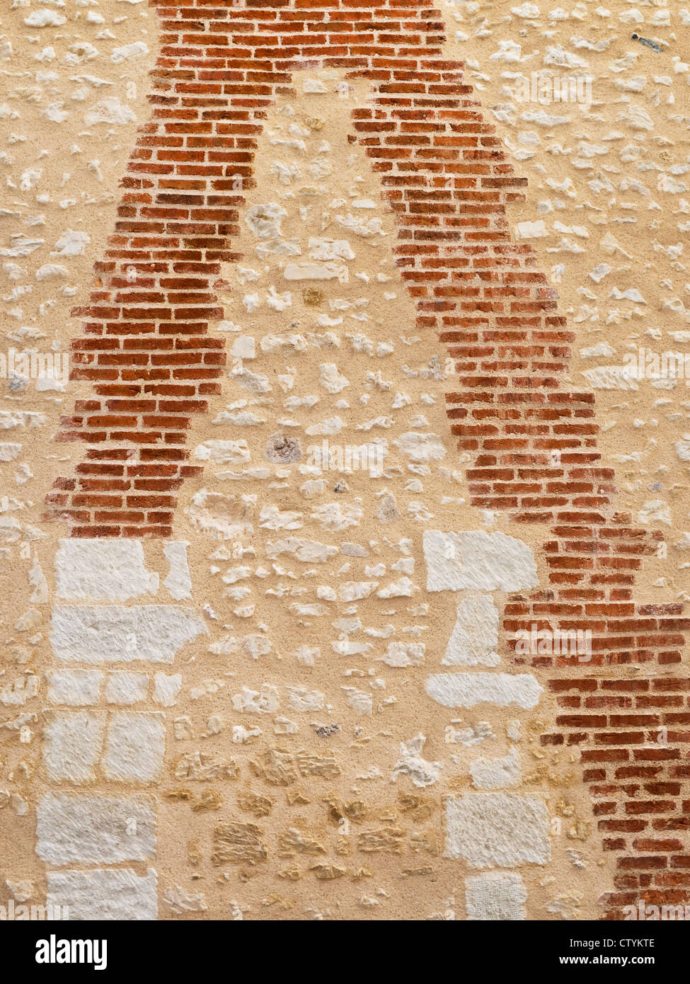 Cleaned and re-pointed wall showing brick and stone detail - France ...