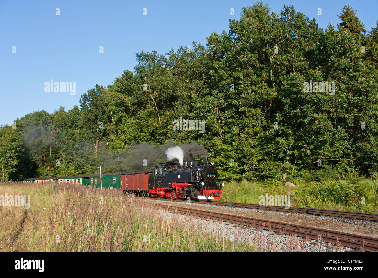 steam train Rasender Roland, train station of Garftitz, Ruegen Island ...