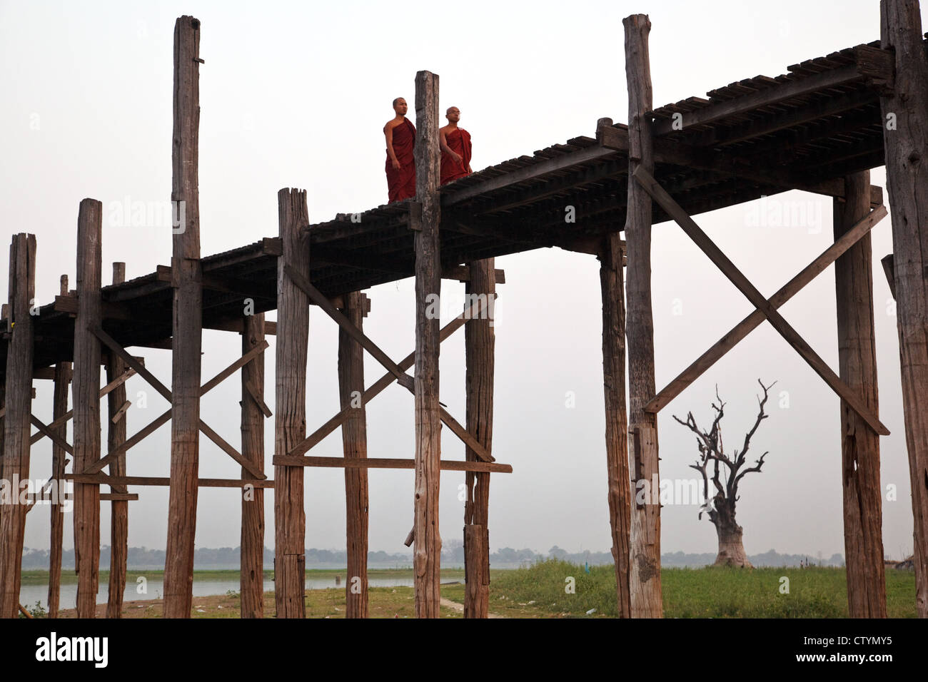 Monks crossing U Bein Bridge - the longest teak bridge (footbridge) in ...