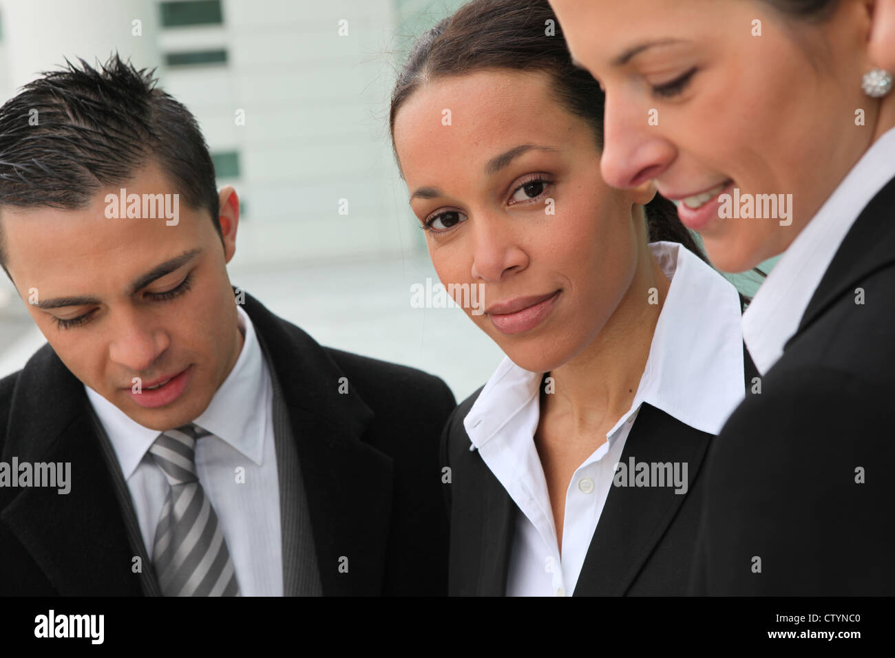 Portrait of three executives Stock Photo - Alamy