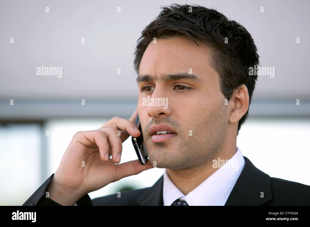 A businessman over the phone Stock Photo - Alamy