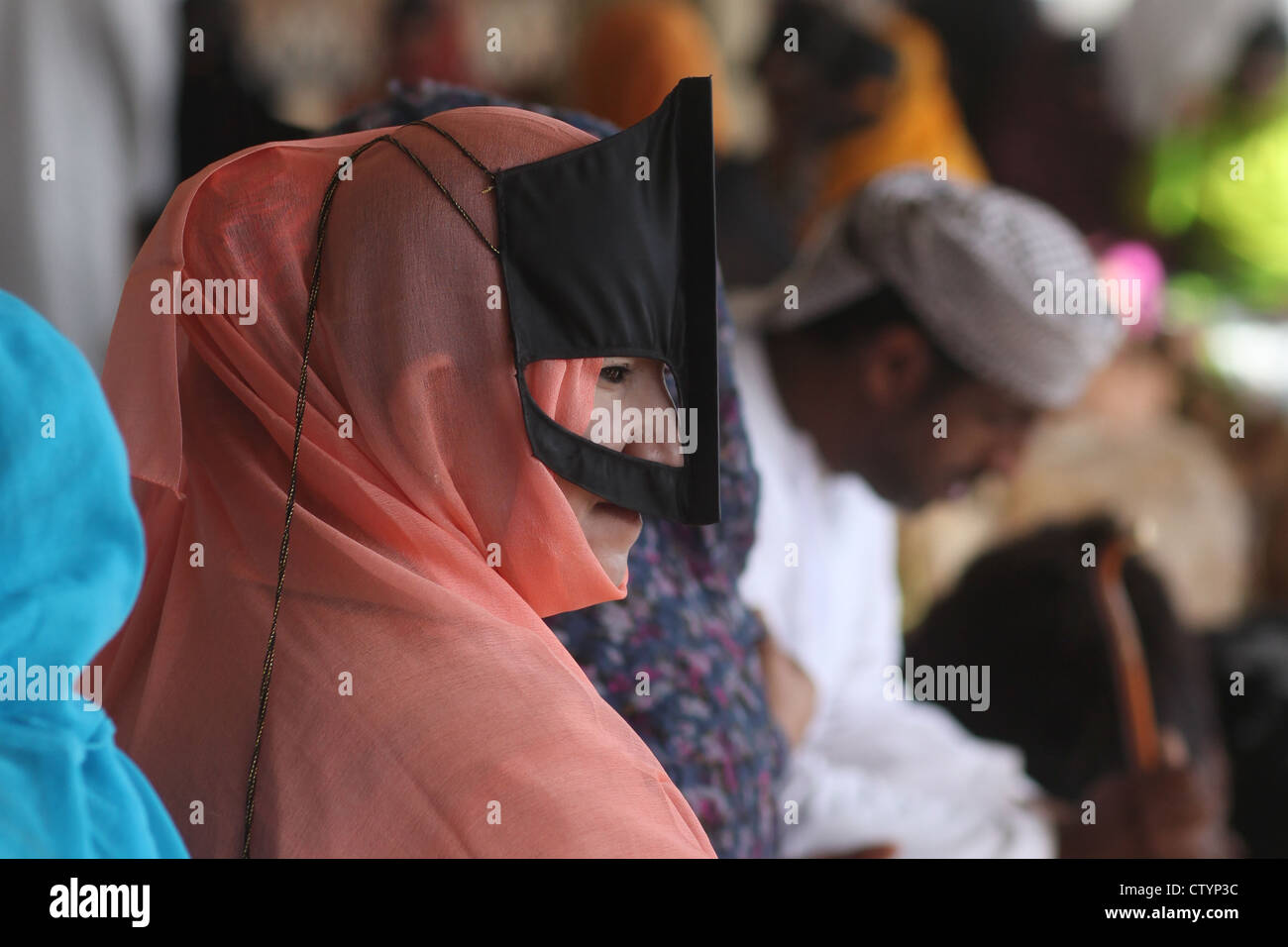 Muslim woman wearing mask and niqaab Stock Photo - Alamy