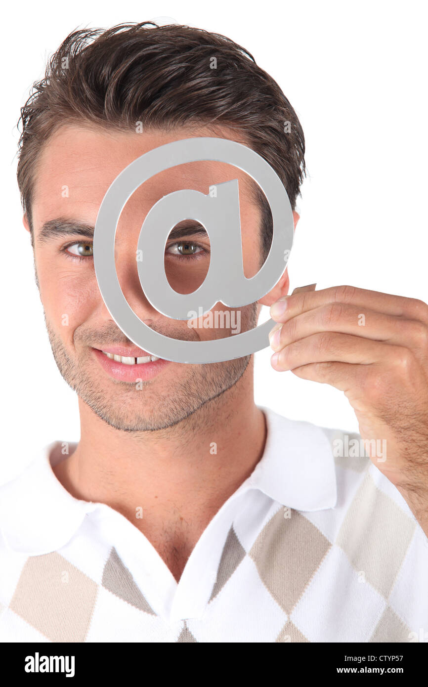 Covering eye with at symbol Stock Photo - Alamy