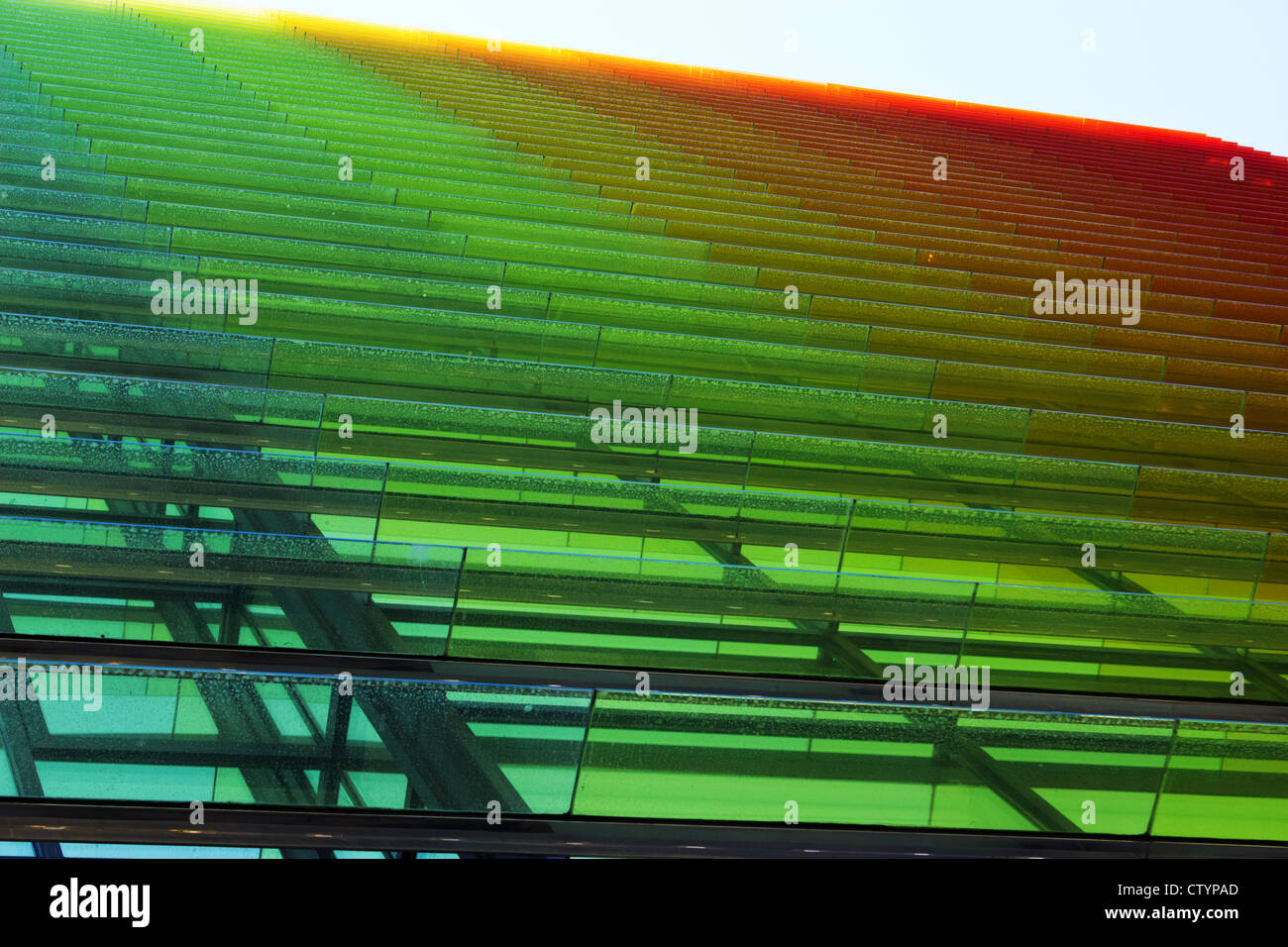 Rainbow coloured glass building Stock Photo - Alamy