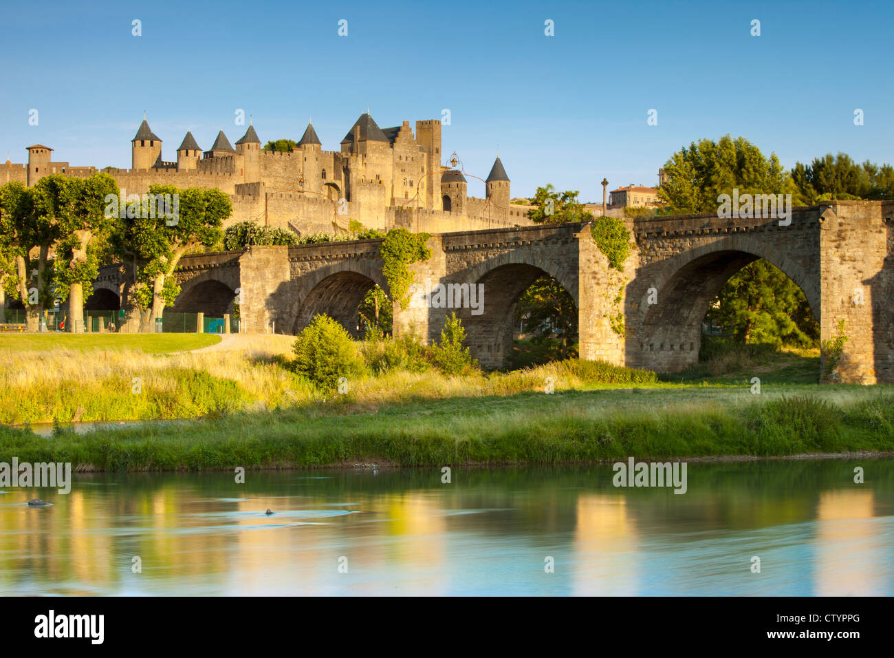 River Aude and Old Bridge (14th Cent) leading to Medieval town of ...