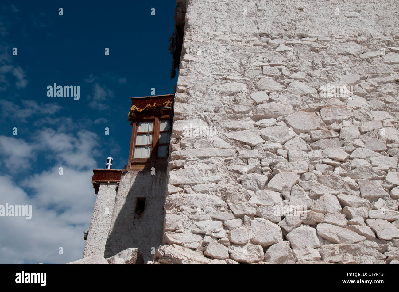Detail of a white stone wall and window at Shey Monastery in Shey ...