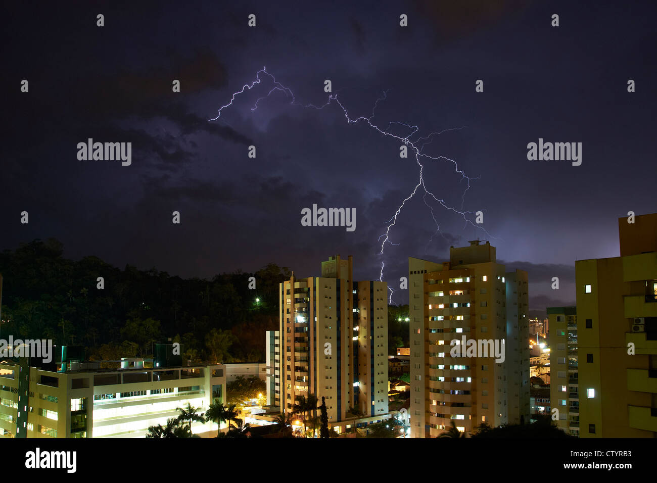 Thunderstorm with lightning and heavy rainfall hi-res stock photography ...
