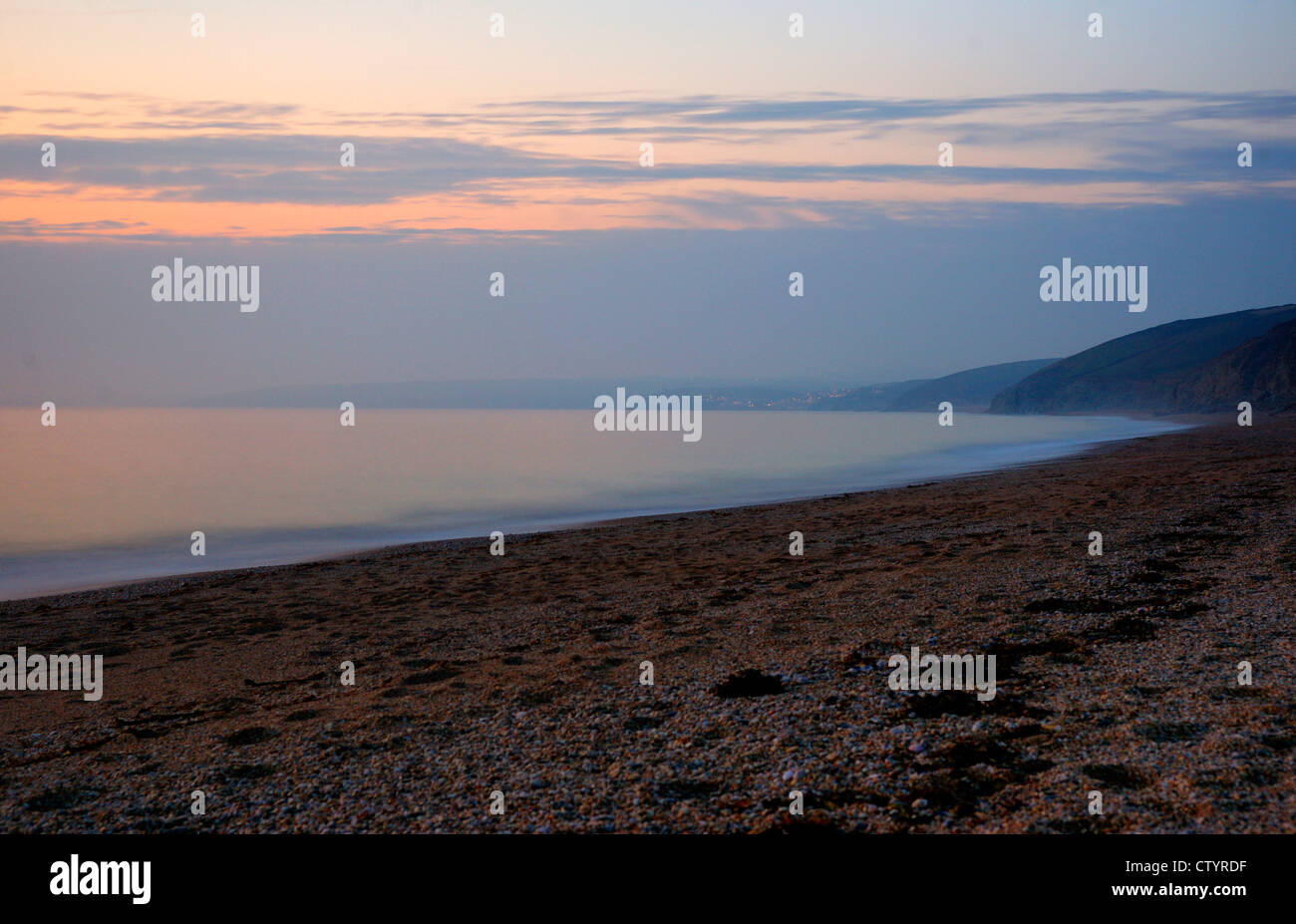 Beautiful skies of the atmospheric beach at sunset in Gunwalloe ...