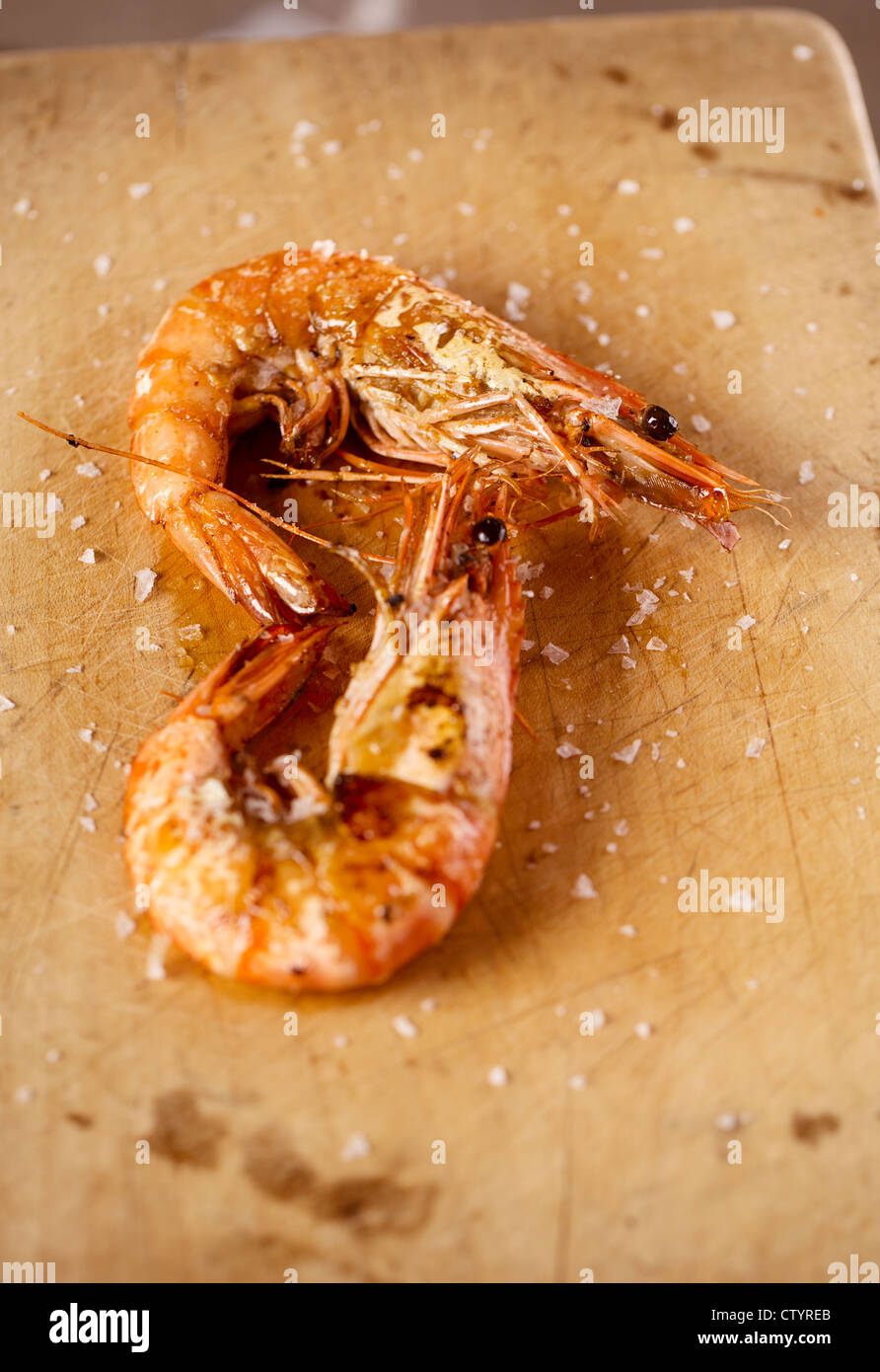 grilled shrimps prawns with salt flakes on wood Stock Photo - Alamy