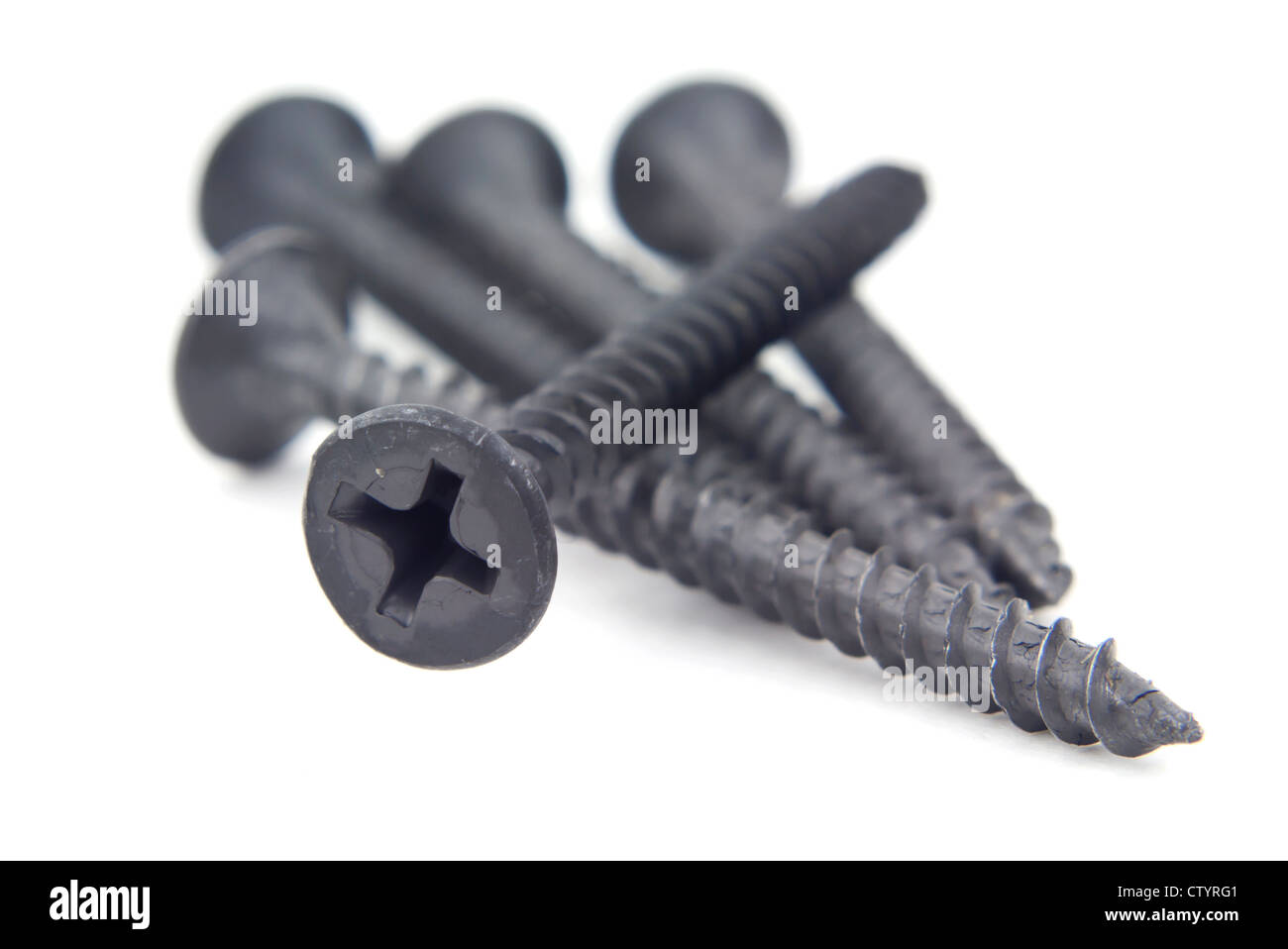 Close up macro of dark gray hardware screws isolated on white ...