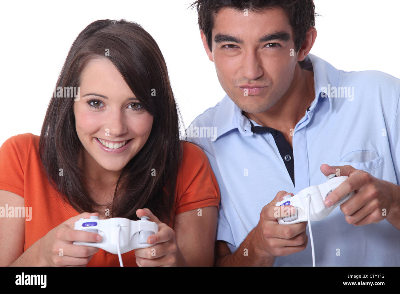 Couple playing video games together Stock Photo - Alamy