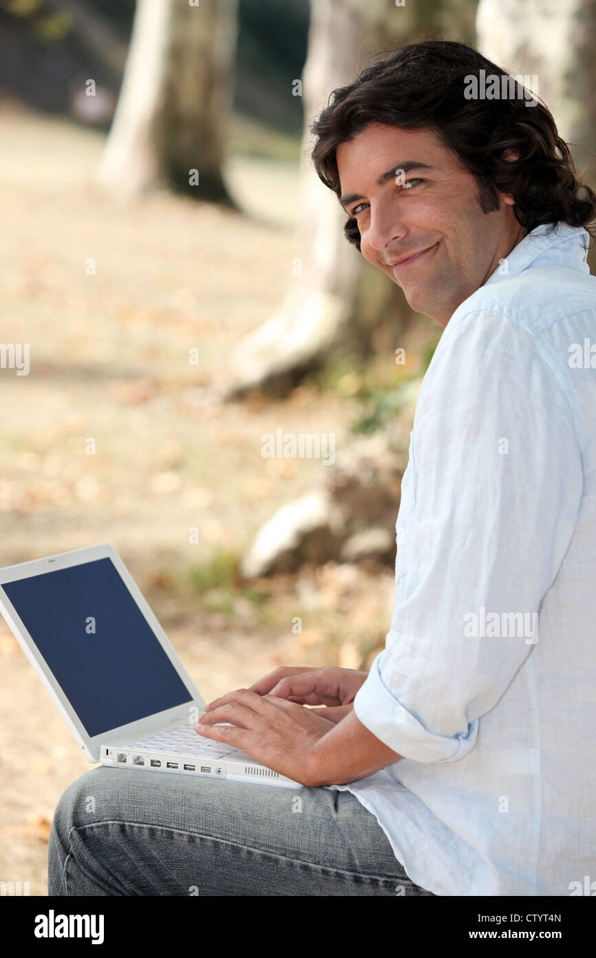 Man with computer Stock Photo - Alamy