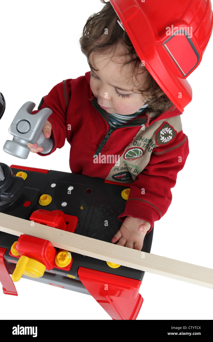 Small boy dressed as builder Stock Photo - Alamy