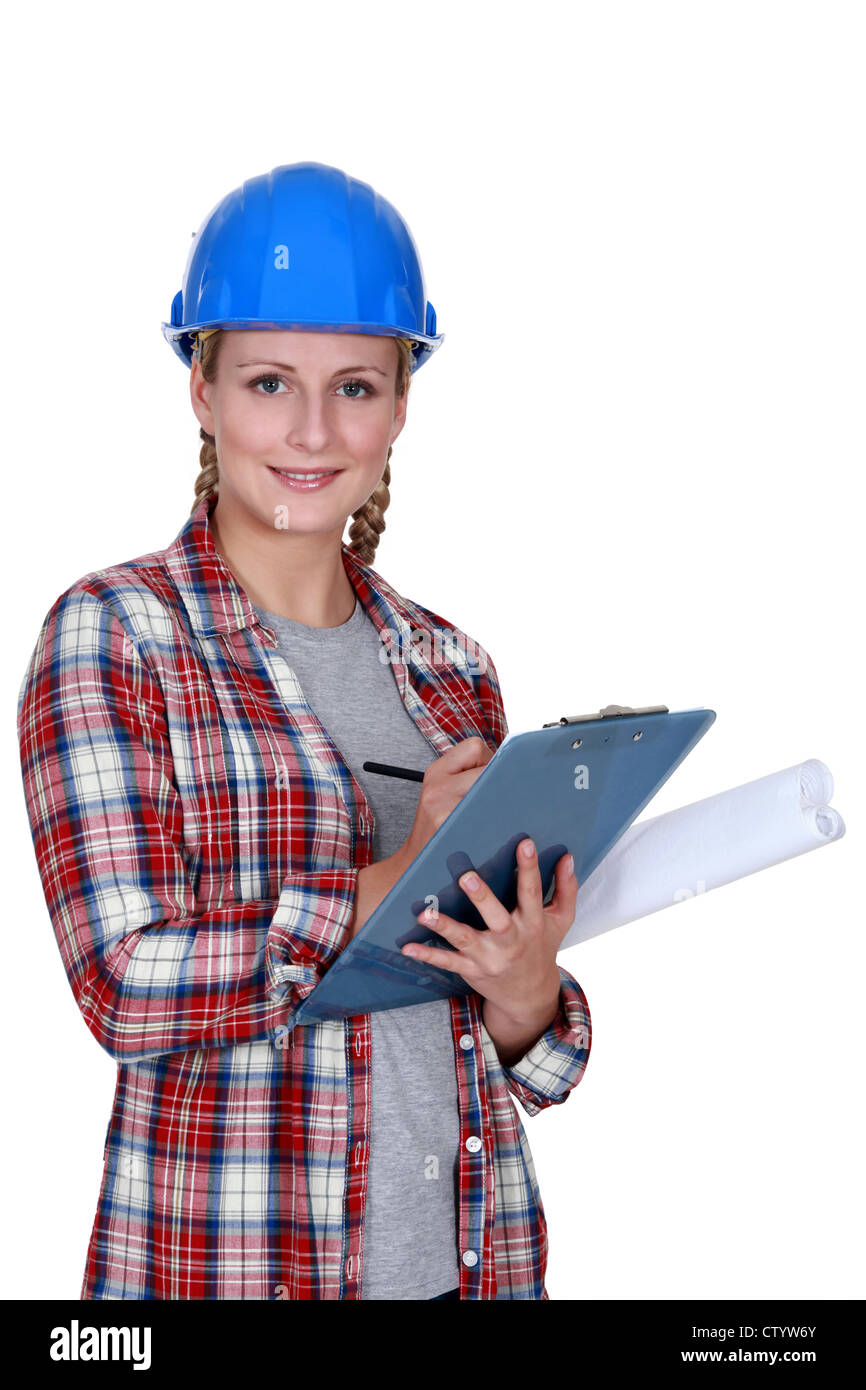 female supervisor with notepad Stock Photo - Alamy