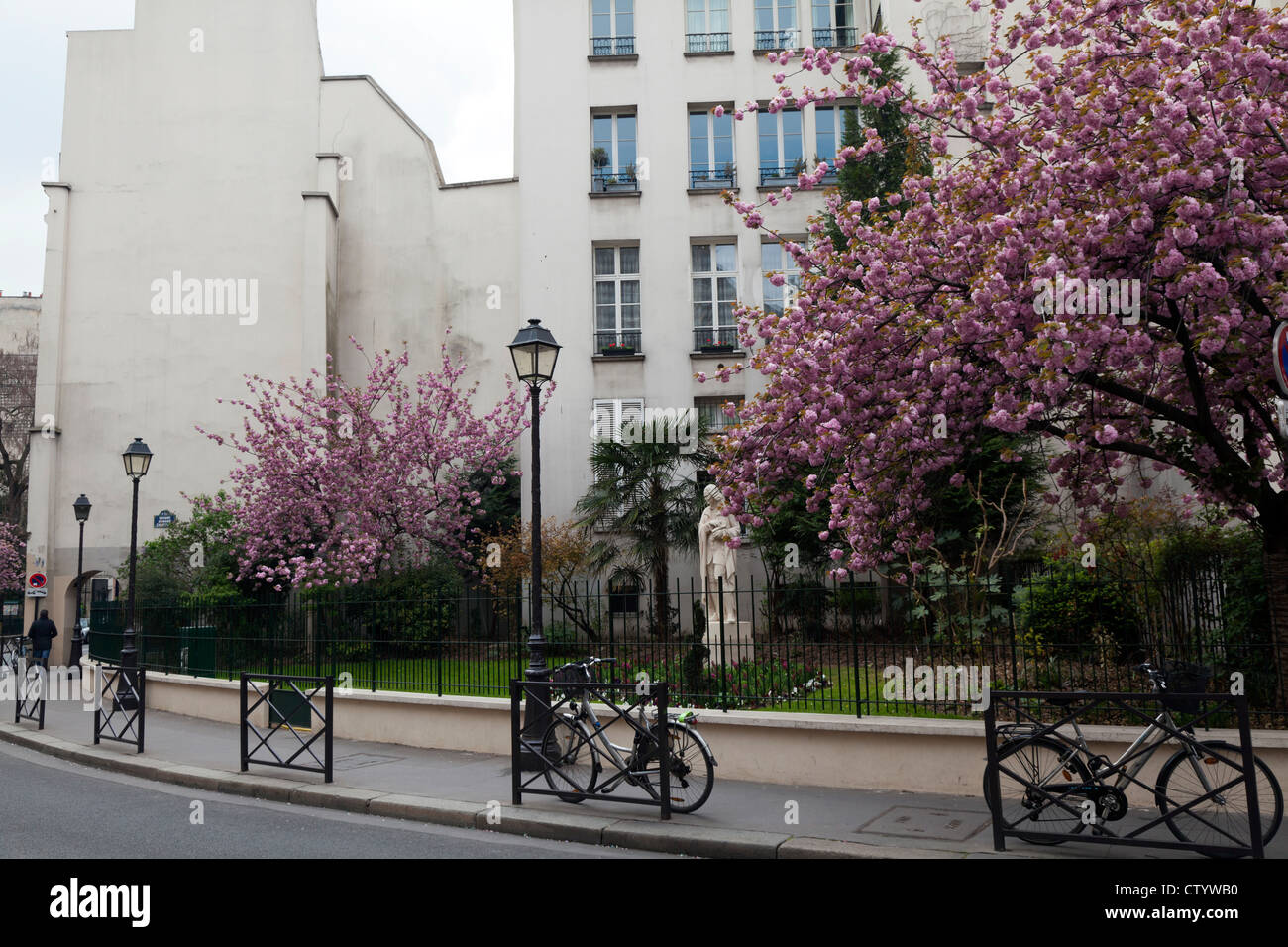 Bicycles in front of small residential square in the 6th arrondissement ...
