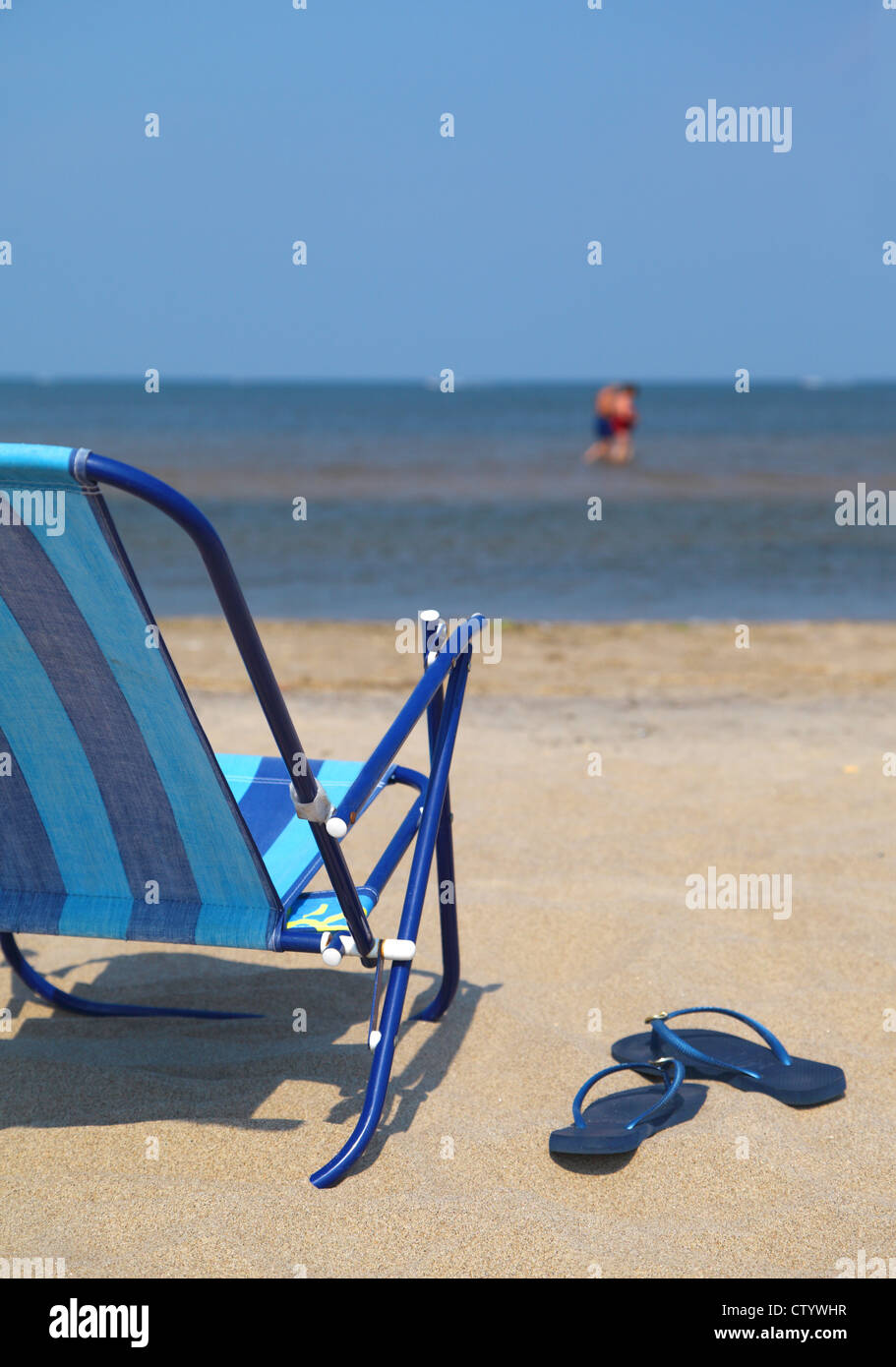 Beach chair wave hi-res stock photography and images - Alamy