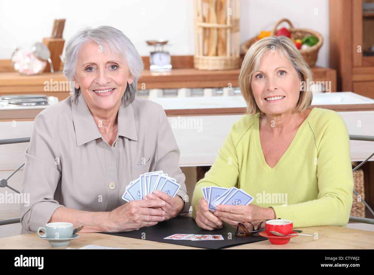 Older women playing cards Stock Photo - Alamy