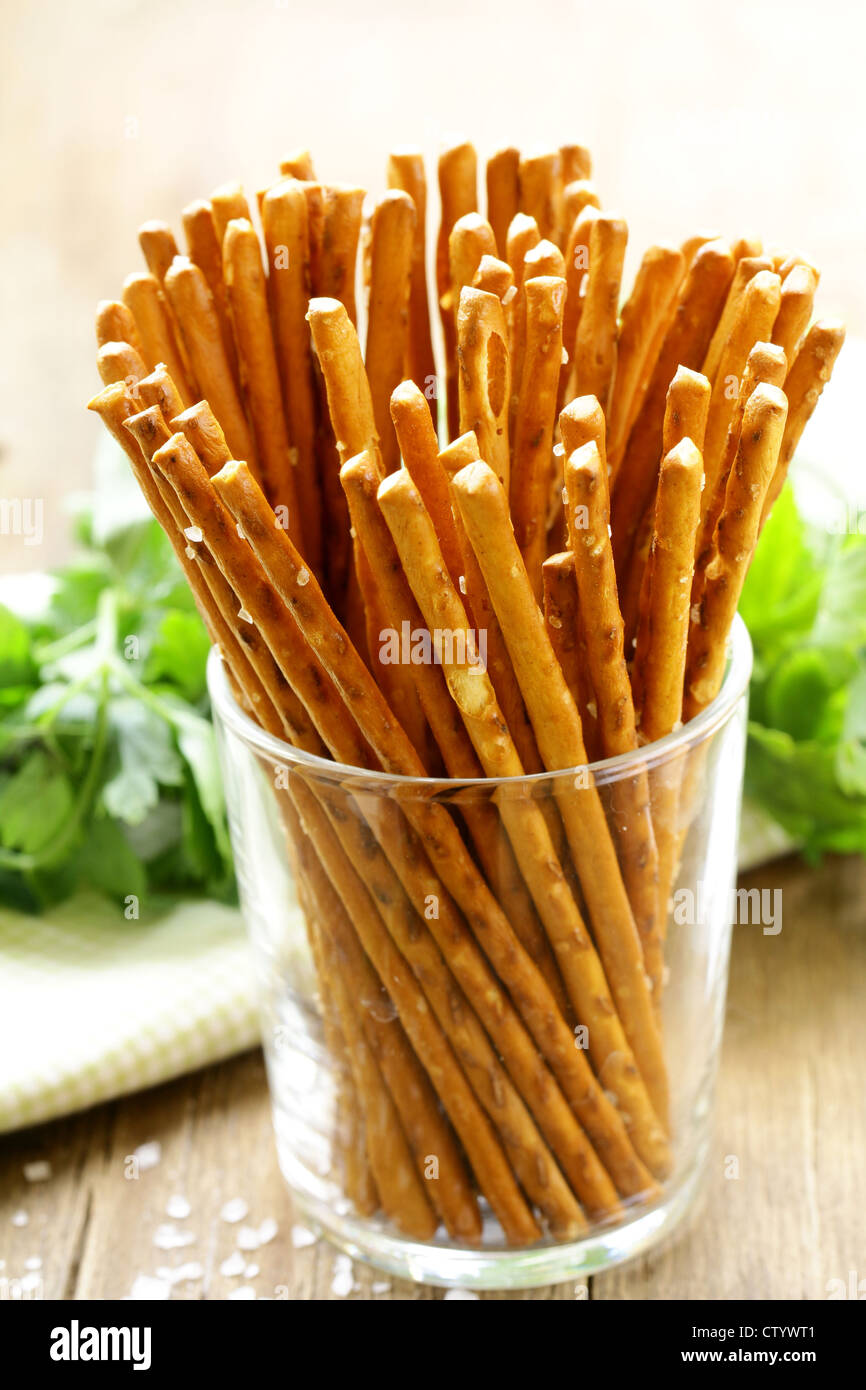 salty snack bread sticks in a glass on the table Stock Photo - Alamy
