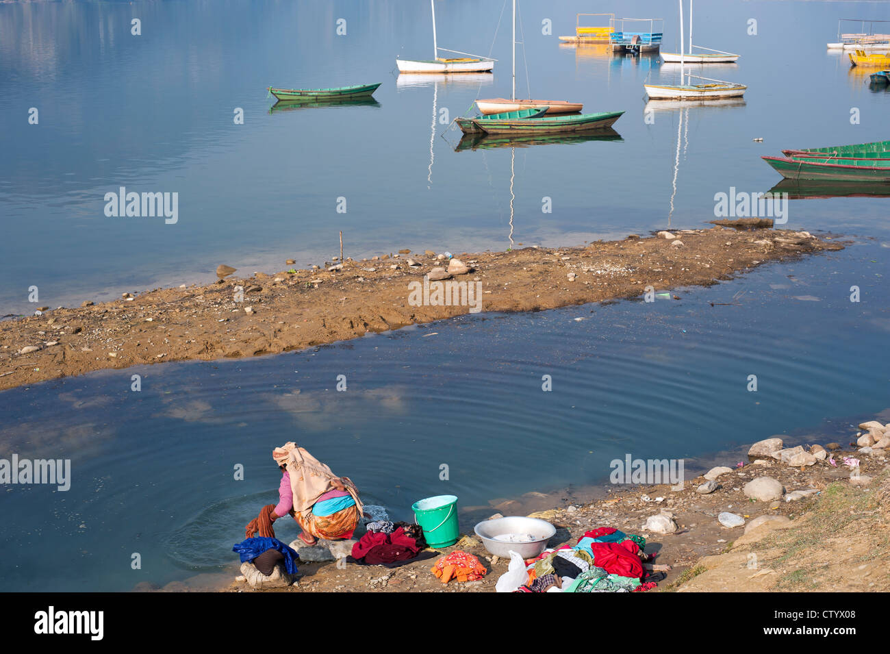 Nepal Pokhara, Colored wooden boat Stock Photo - Alamy