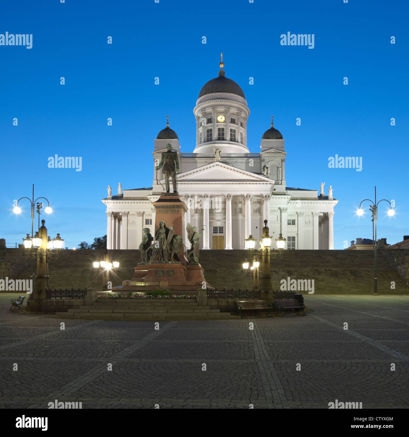 Building and statue lit up at night Stock Photo - Alamy