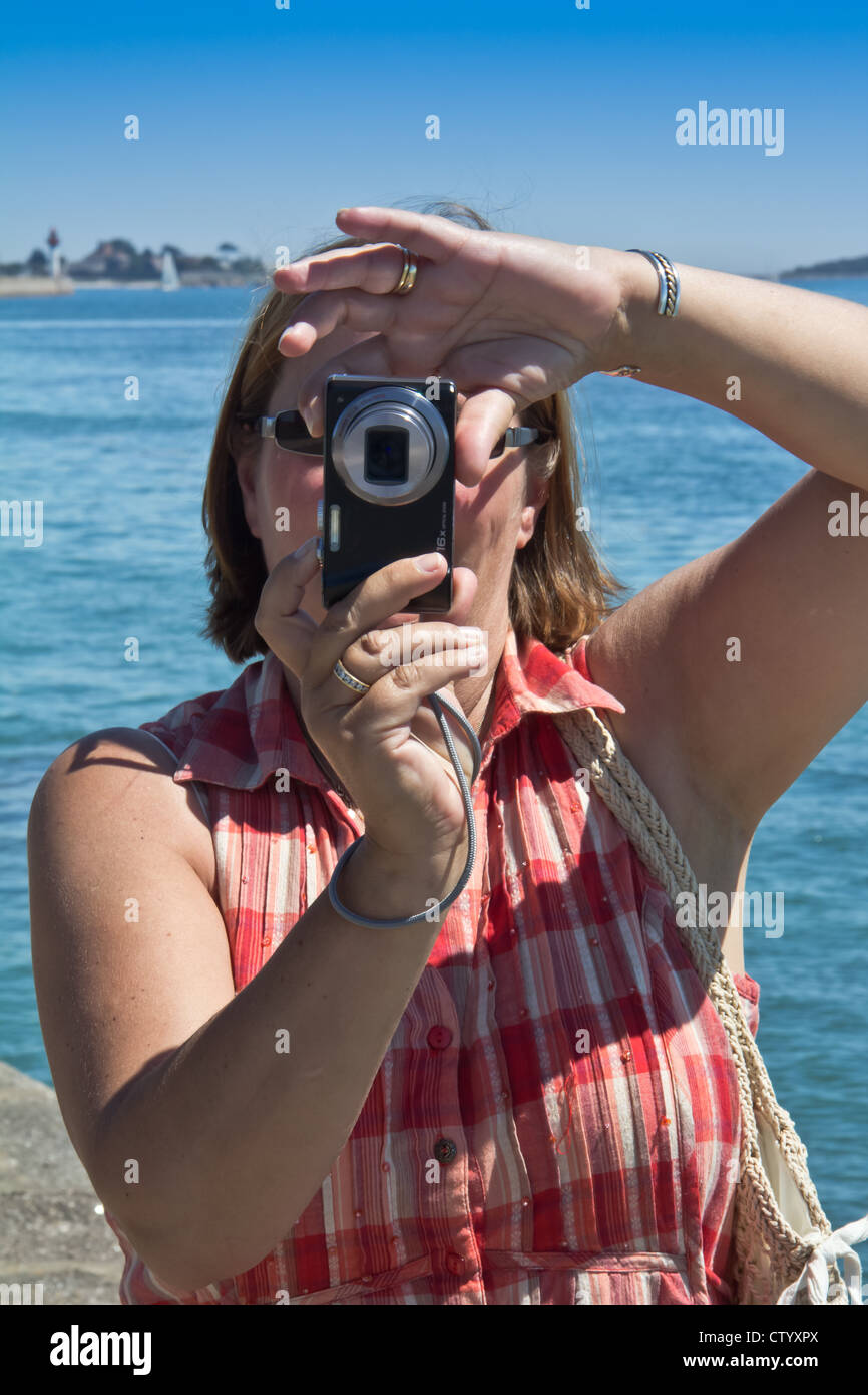 Woman taking Photographs Stock Photo - Alamy